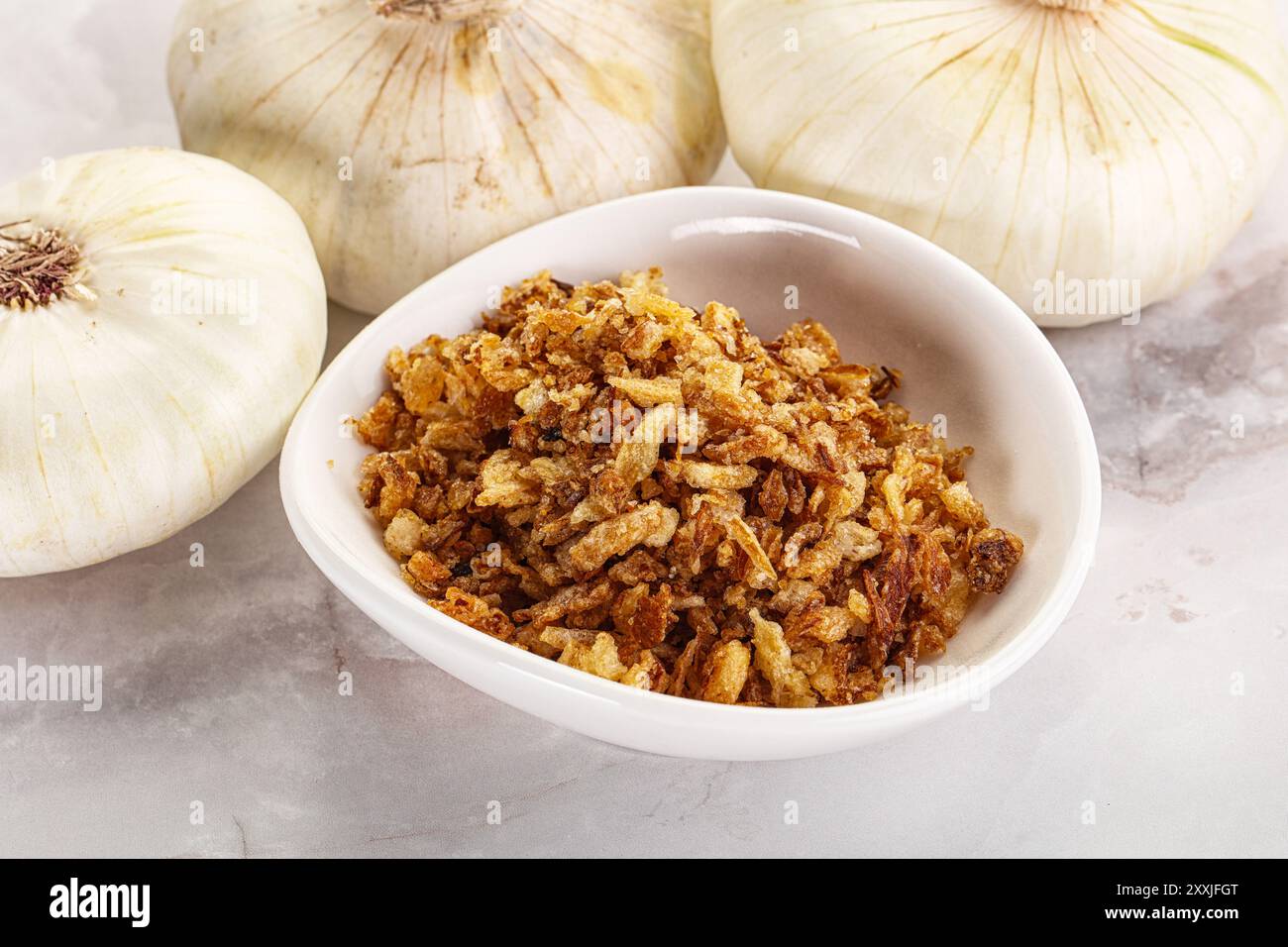 Dried roasted onion crunchy flakes for culinary Stock Photo - Alamy