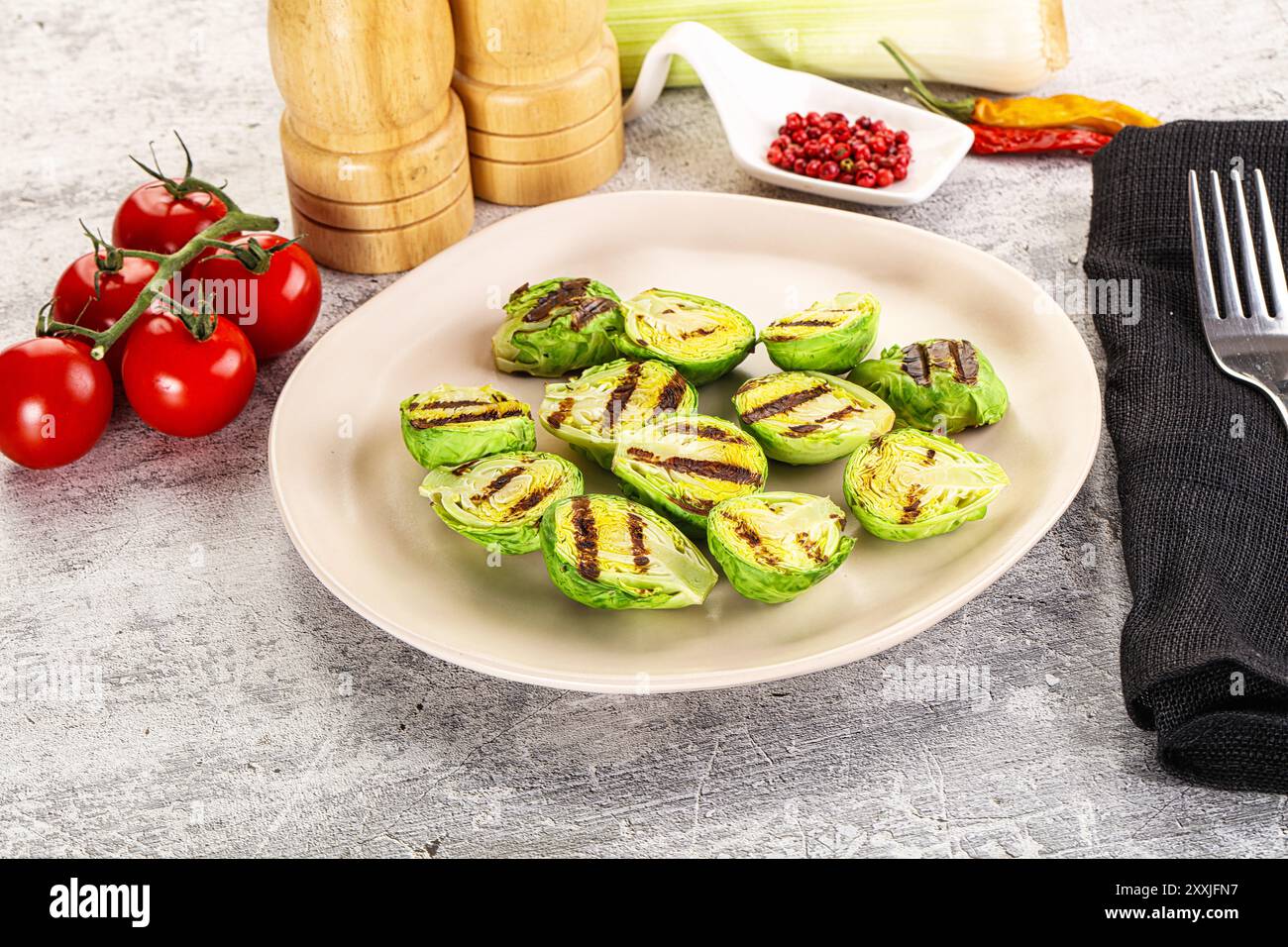 Vegan cuisine Grilled green brussel sprout cabbage Stock Photo - Alamy