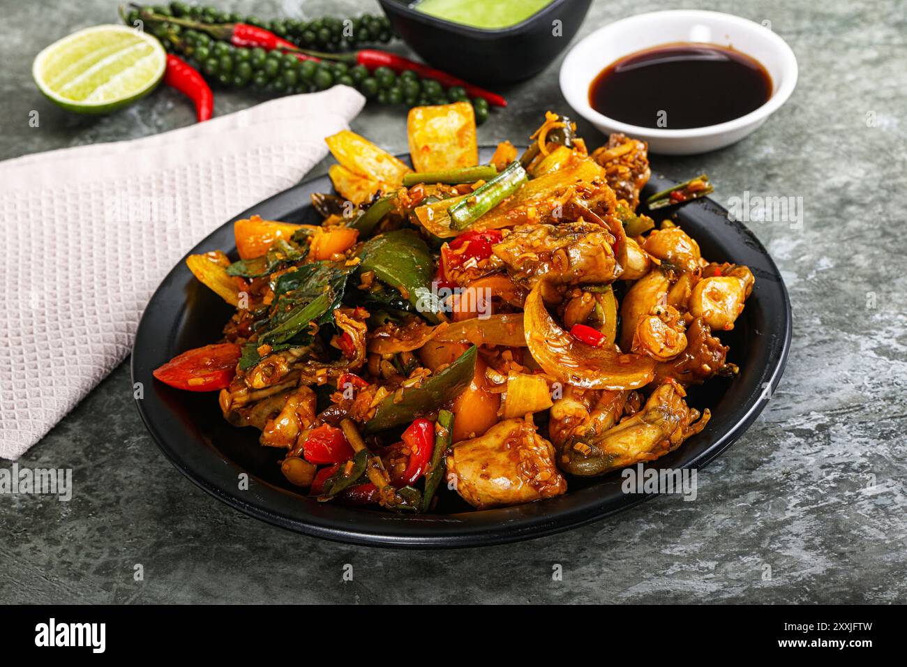 Vietnamese cuisine - fried frog with vegetables and spices Stock Photo ...