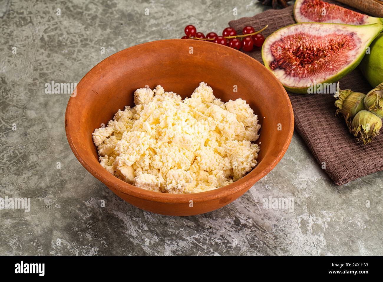 Delicous sheep cottage cheese curd served fig Stock Photo - Alamy