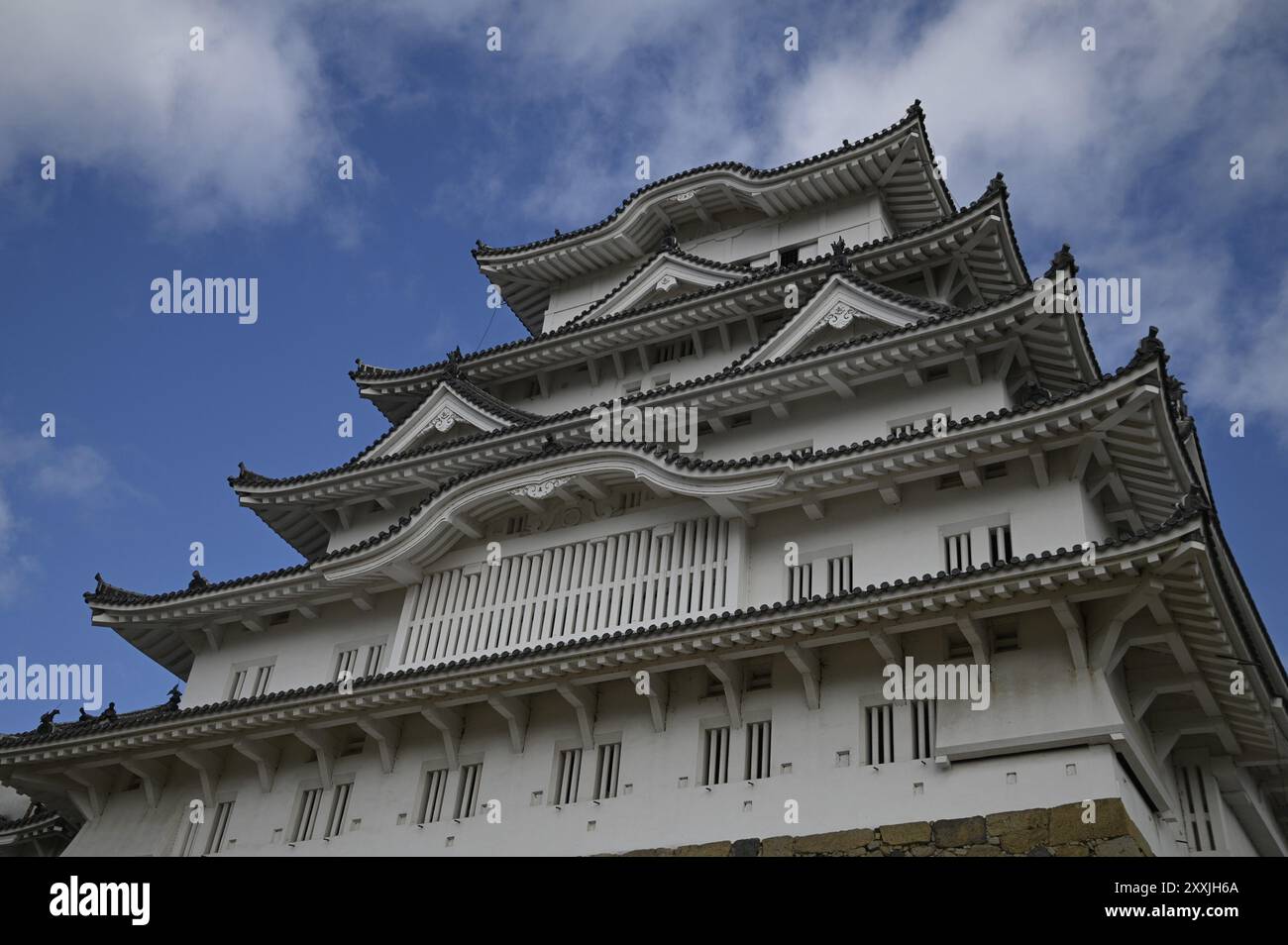 Scenic view of the striking Main Donjon curved gables part of Himeji-jō ...