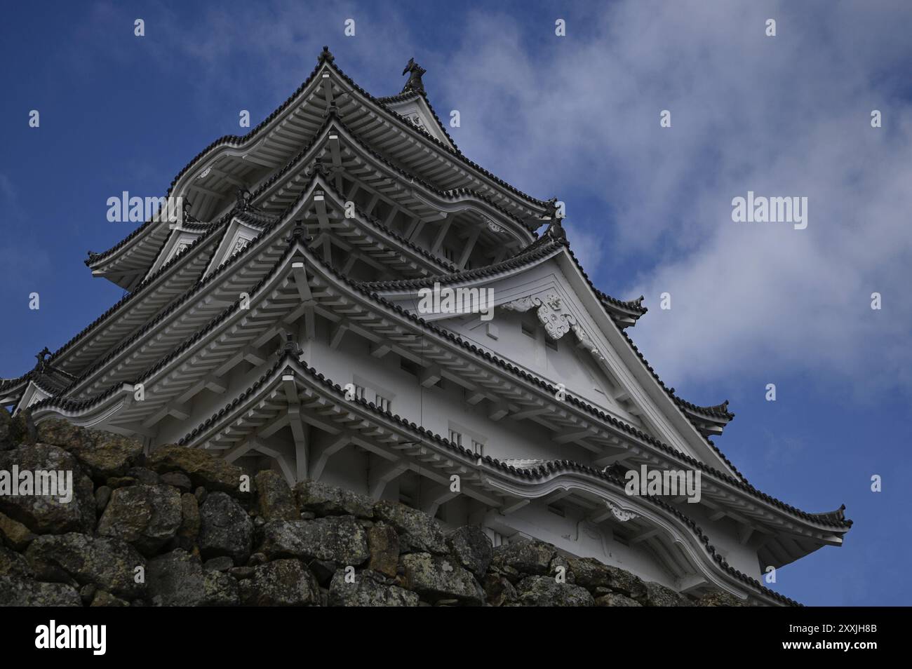 Scenic view of the striking Main Donjon curved gables part of Himeji-jō ...