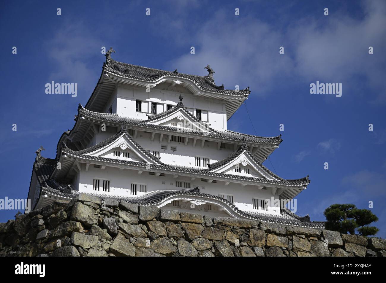 Scenic view of the striking Main Donjon curved gables part of Himeji-jō ...