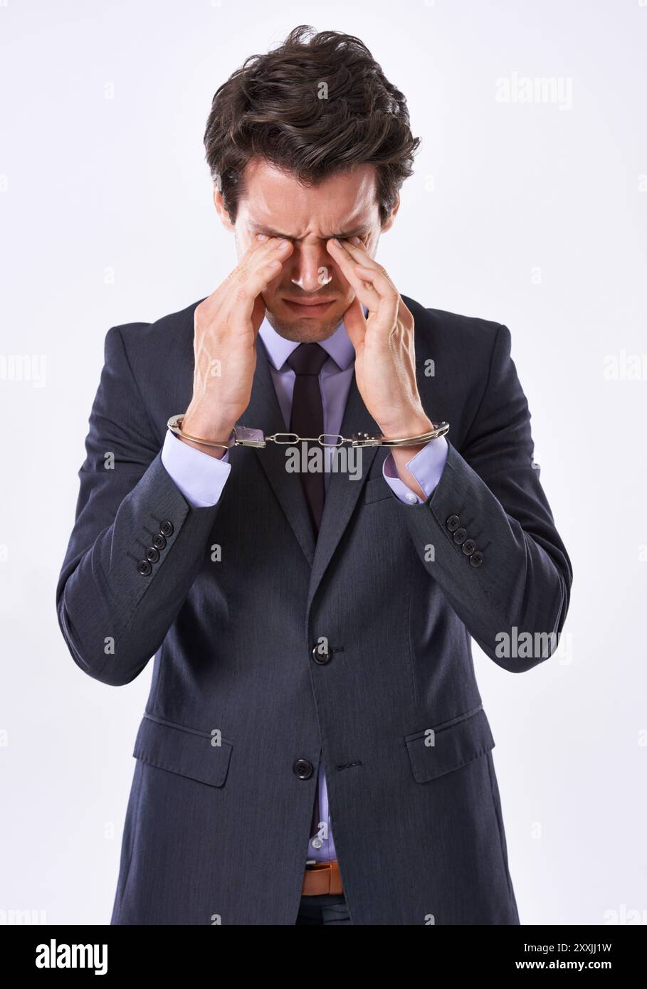 Businessman, handcuffs and fraud with stress for crime or ponzi scheme ...