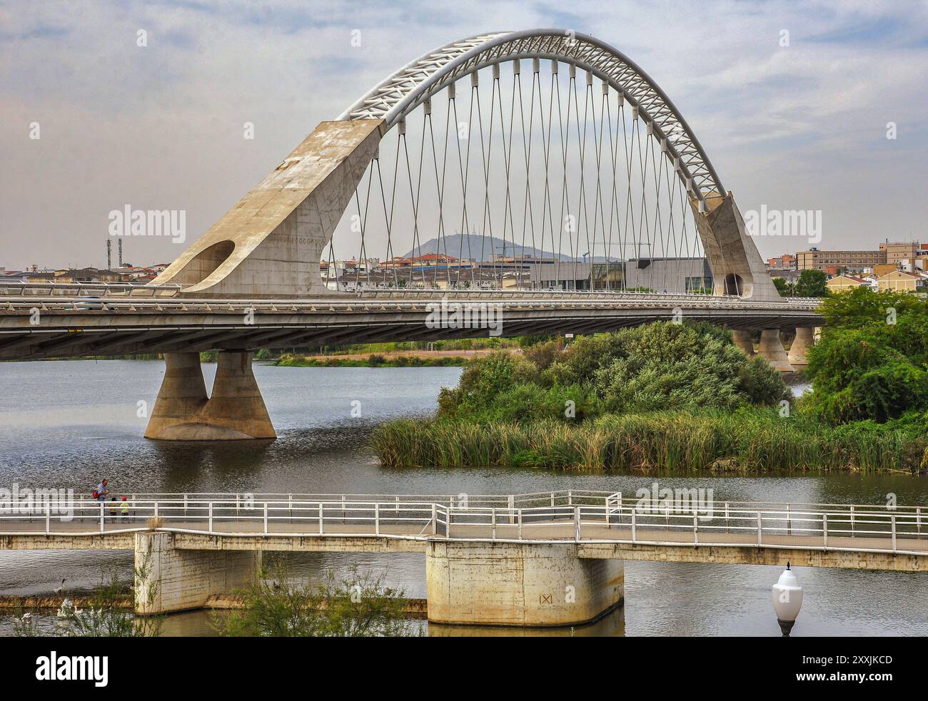 The modern 20th-century Lusitania Bridge, a sleek suspension bridge ...