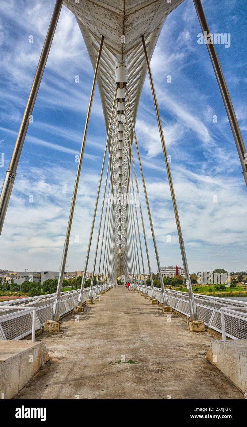 The modern 20th-century Lusitania Bridge, a sleek suspension bridge ...