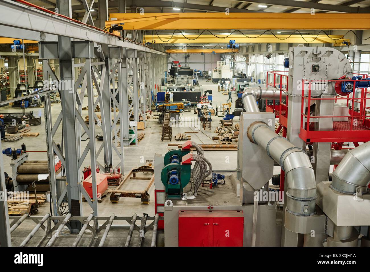 Industrial warehouse filled with advanced machinery and equipment for ...