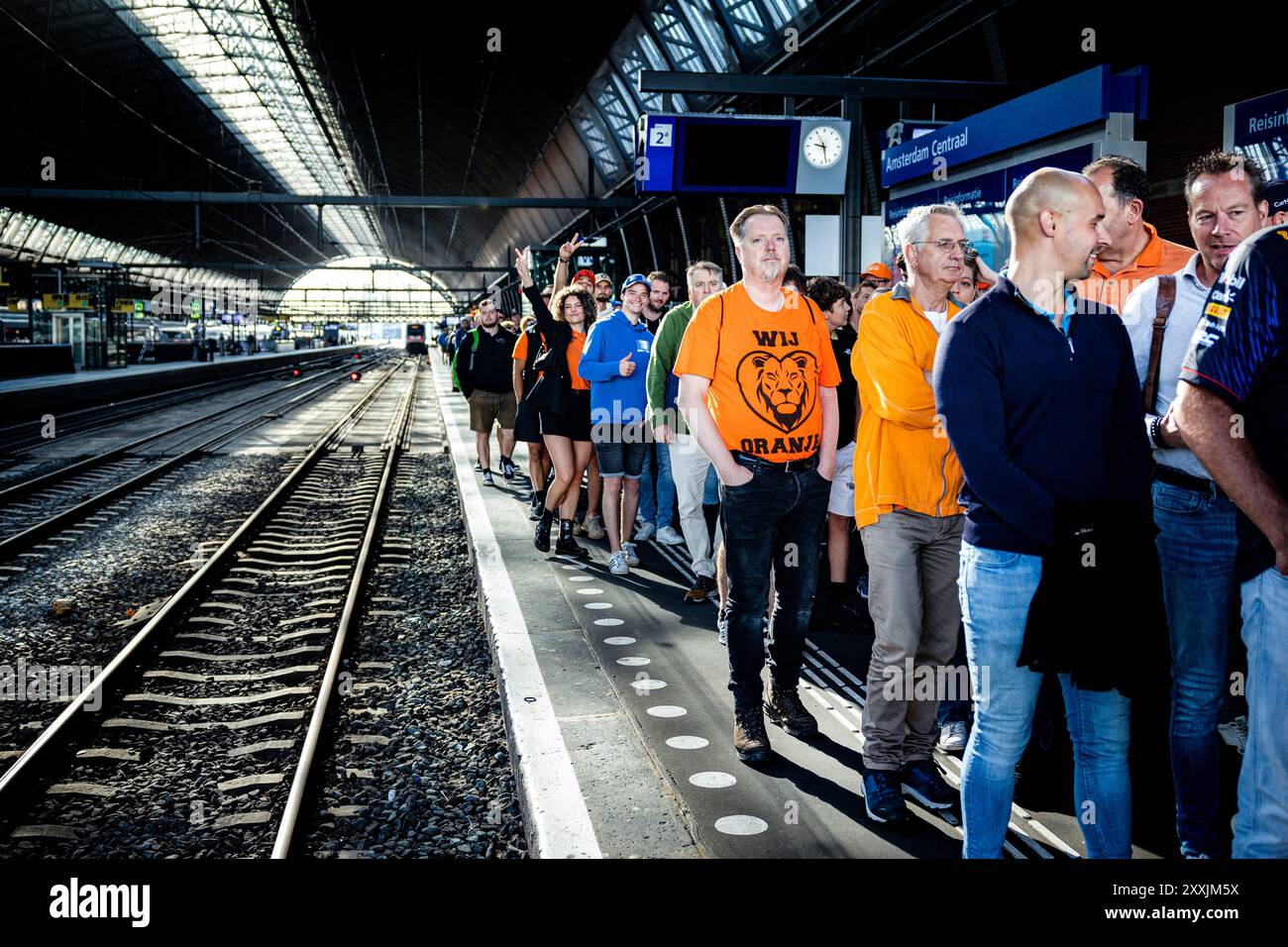 ZANDVOORT - Race fans at Amsterdam Central Station on their way to ...