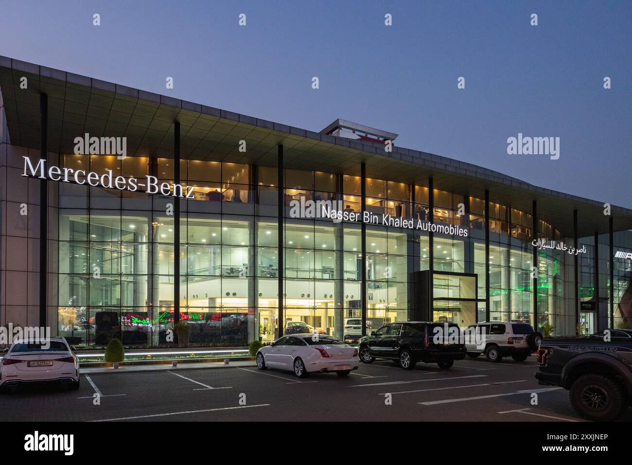 The logo of the brand "Mercedes Benz", Qatar showroom. Car business ...
