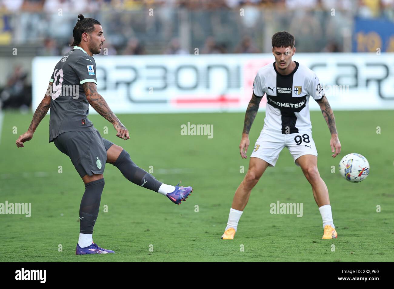 Theo Hernandez (Milan)Dennis Man (Parma) during the Italian "Serie A ...