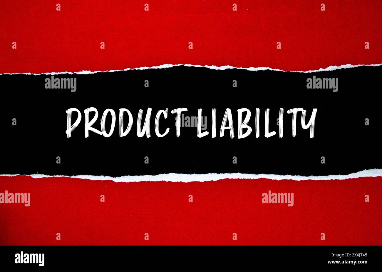Product liability message written on ripped torn red paper with black background. Conceptual ...