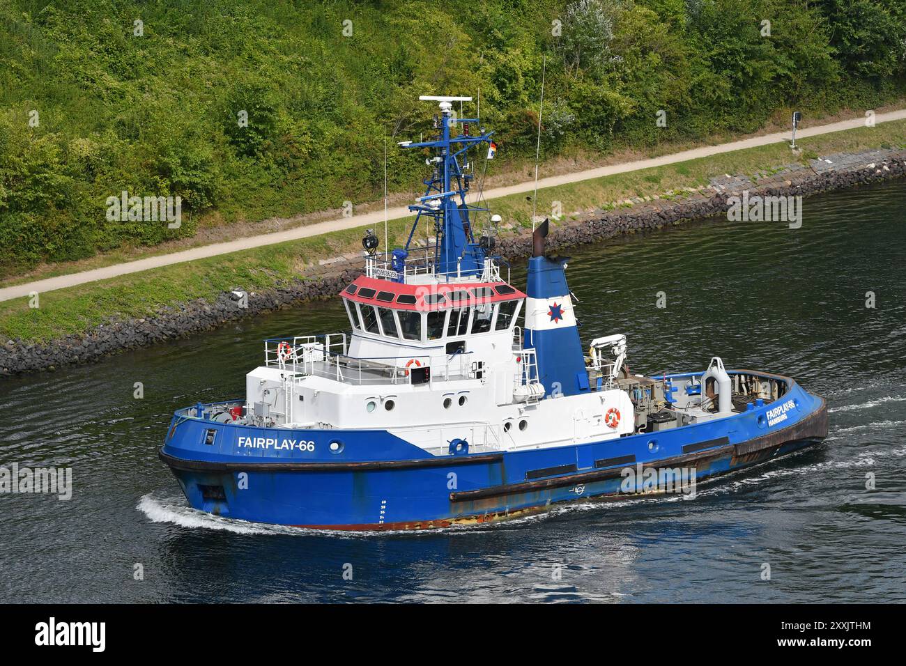 Tug FAIRPLAY-66 passing the Kiel Canal Stock Photo - Alamy