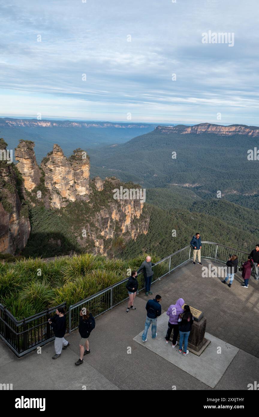 The famous three finger-shaped peaks are known as The Three Sisters ...