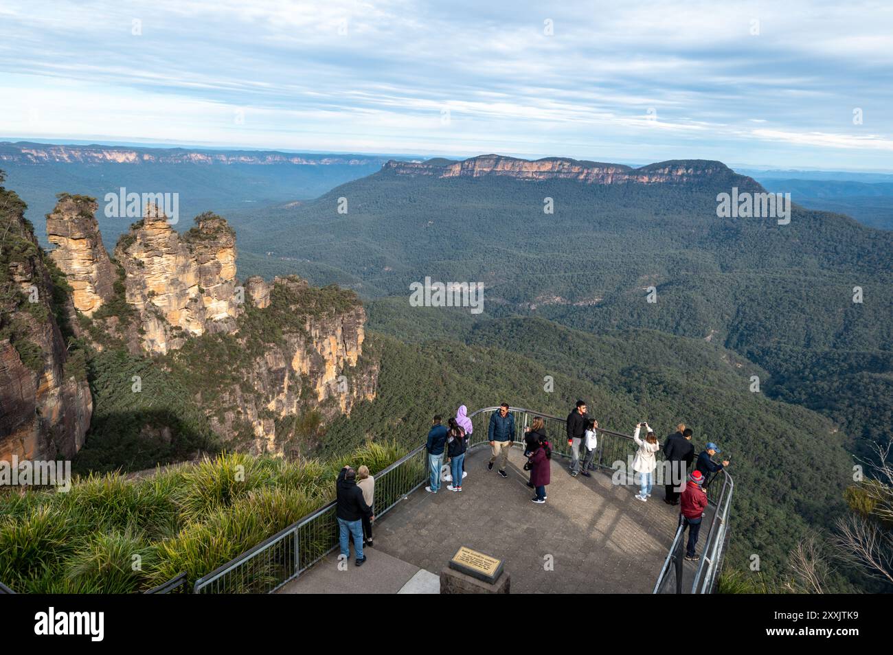 The famous three finger-shaped peaks are known as The Three Sisters ...