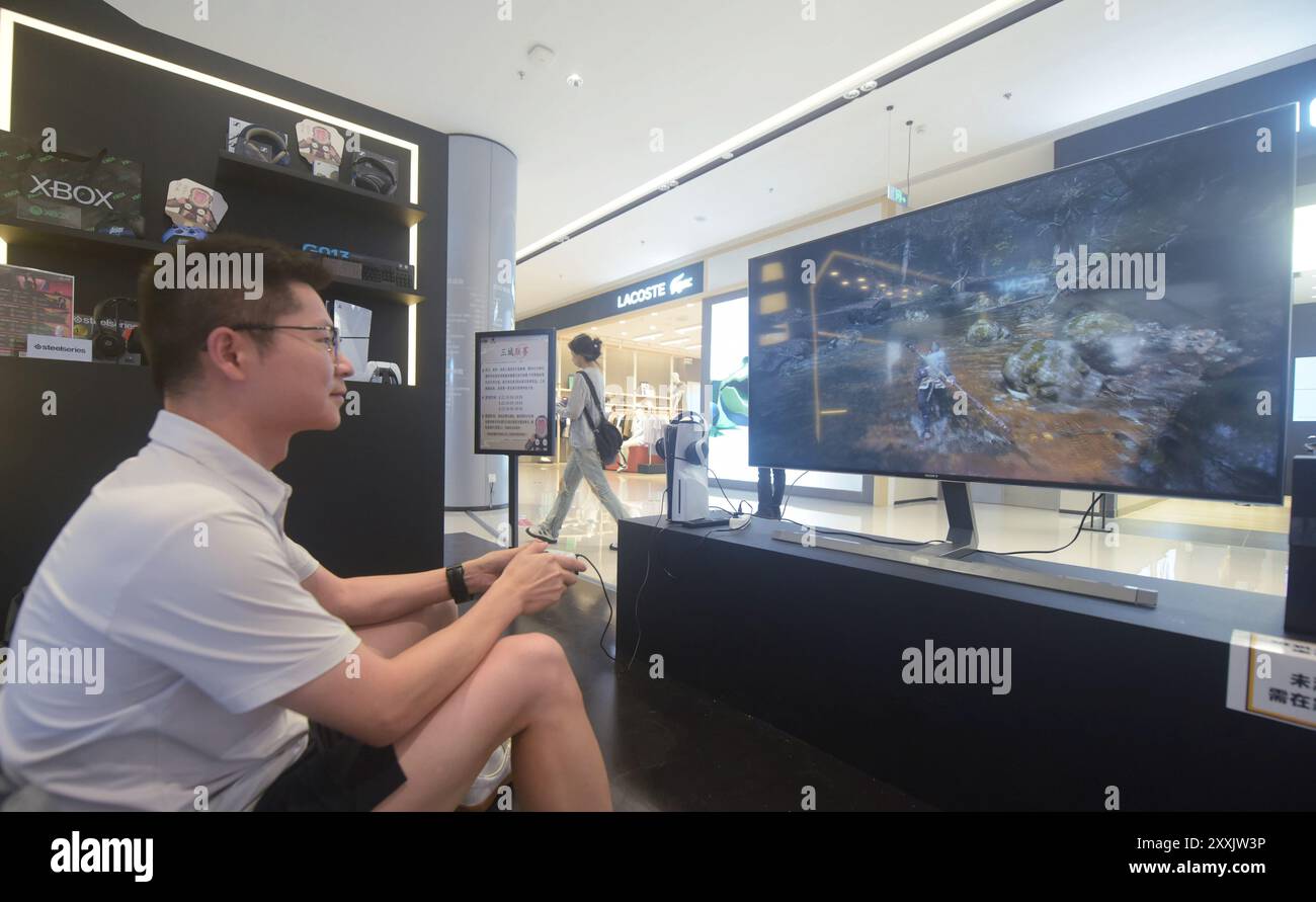 HANGZHOU, CHINA - AUGUST 25, 2024 - Customers play the first Chinese ...