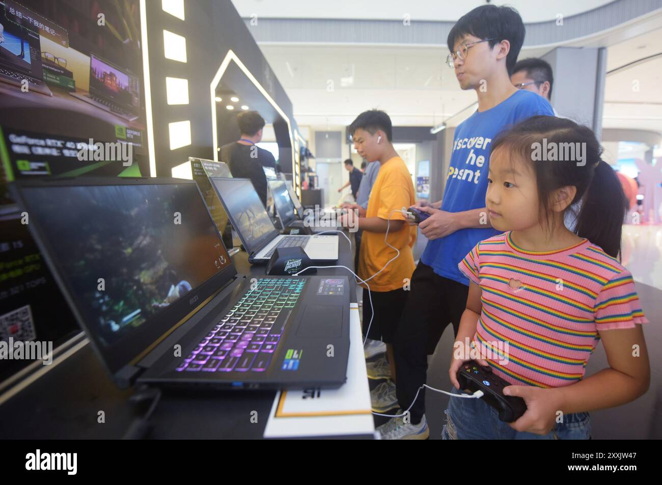 HANGZHOU, CHINA - AUGUST 25, 2024 - Customers play the first Chinese ...