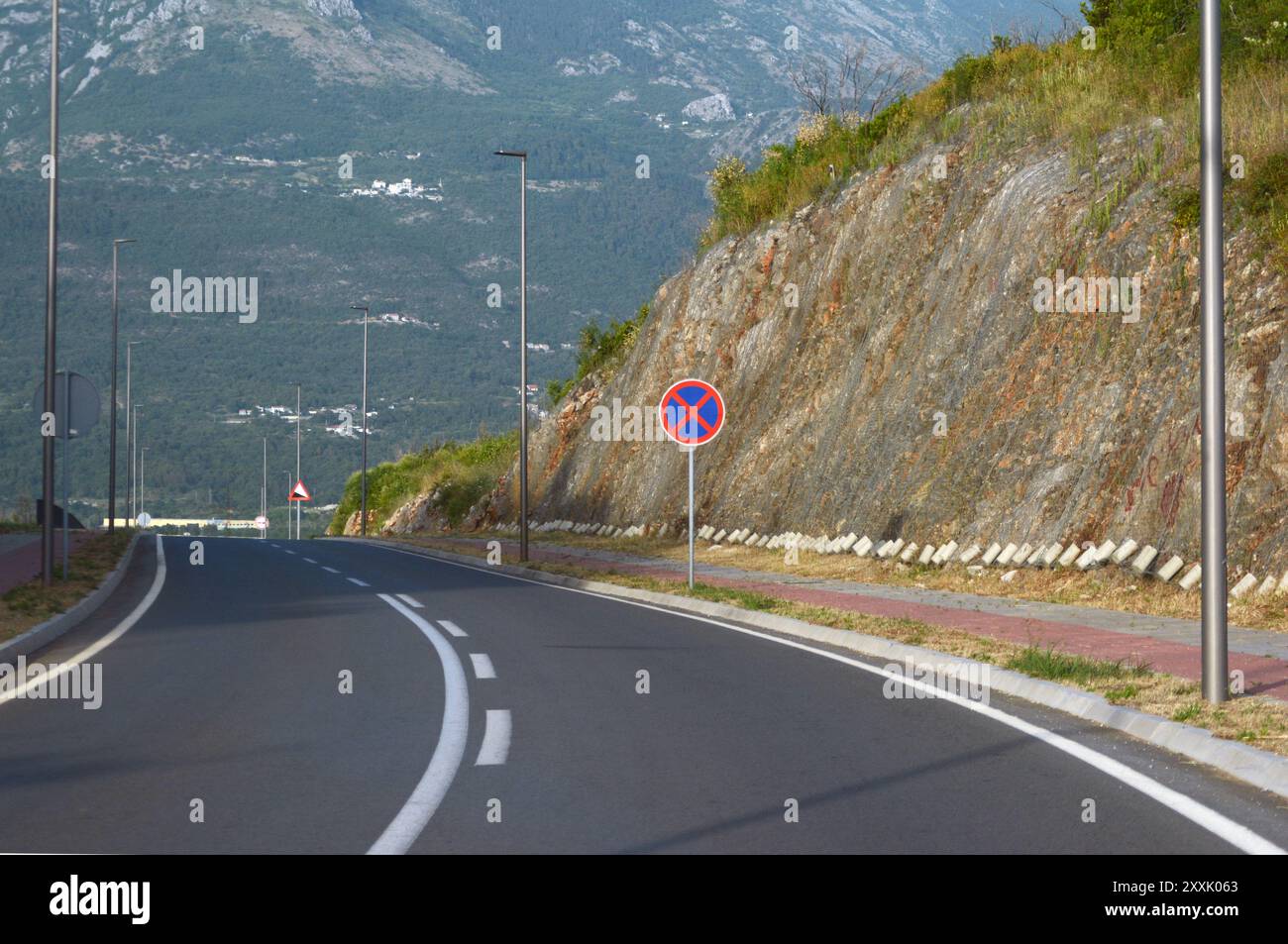 Beside asphalt road sign hi-res stock photography and images - Alamy