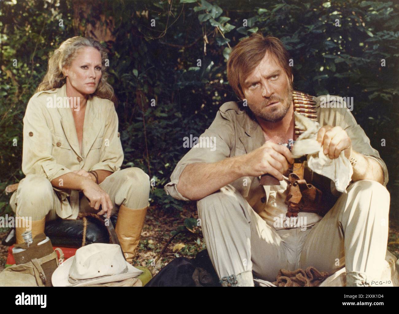 URSULA ANDRESS and STACY KEACH in a scene from SLAVE OF THE CANNIBAL ...