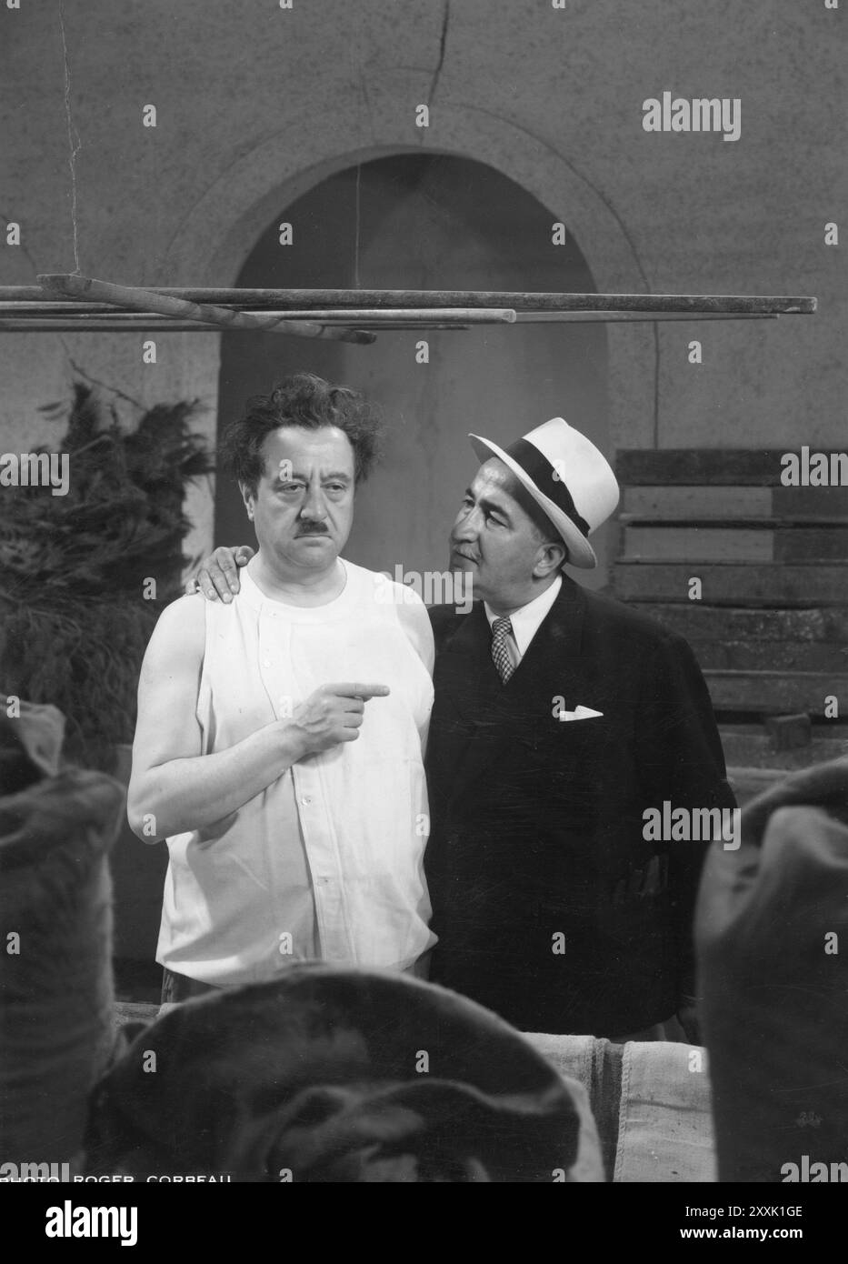 RAIMU and FERNAND CHARPIN in a scene from LA FEMME DU BOULANGER / THE ...