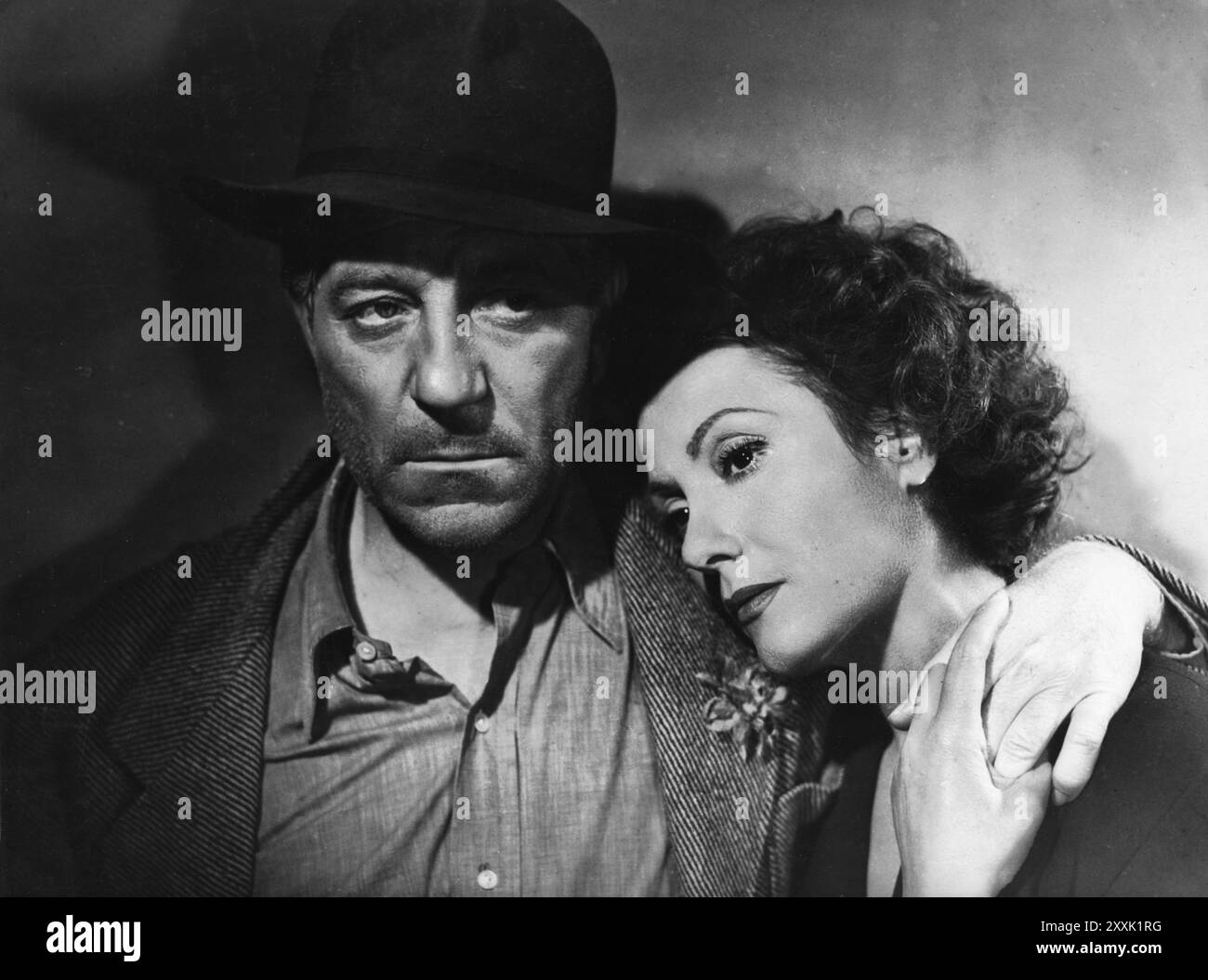 French actor JEAN GABIN and ISA MIRANDA in a scene from LE MURA DI ...
