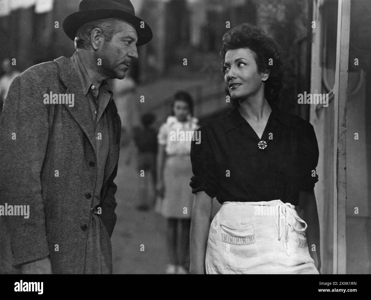 French actor JEAN GABIN, ISA MIRANDA and VERA TALCHI in a scene from LE ...