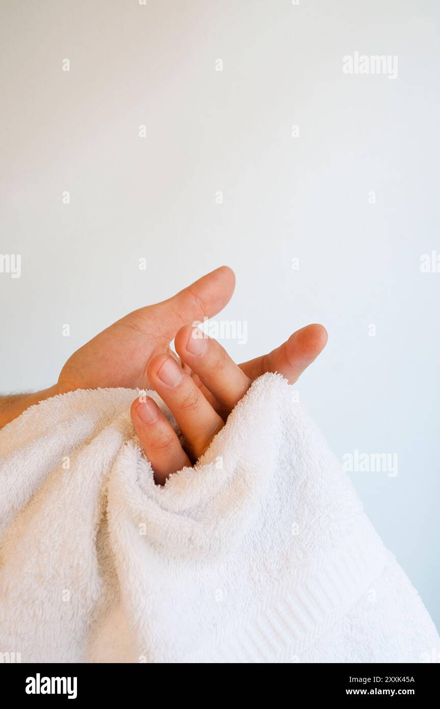 Man drying hands towel hi-res stock photography and images - Alamy