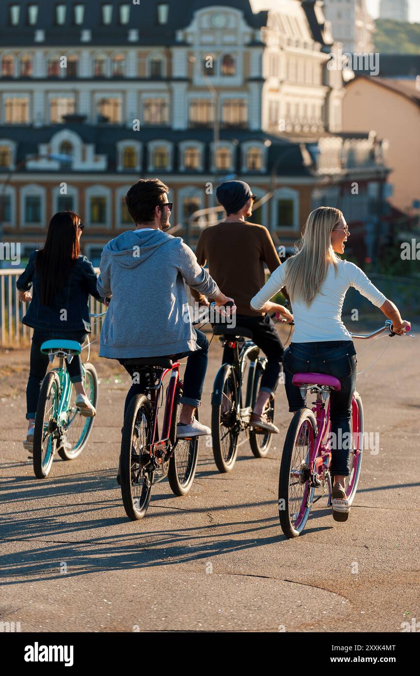 Young women friends bicycles hi-res stock photography and images - Alamy