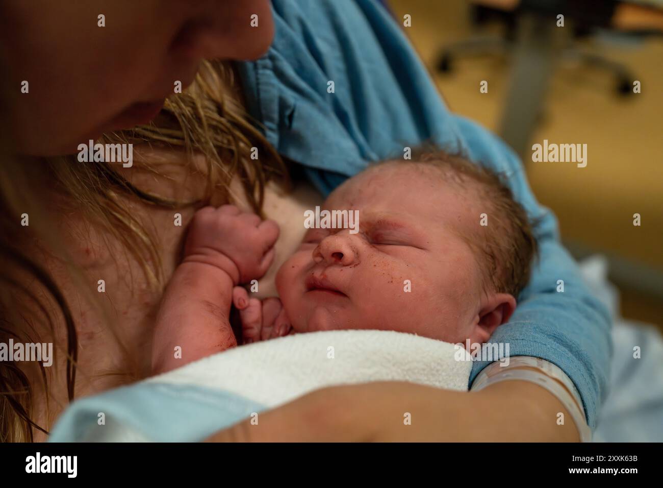 Newborn Babys First Moments with Parent in Hospital Stock Photo - Alamy