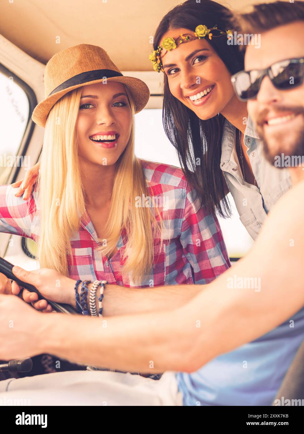 Carefree friends inside van hi-res stock photography and images - Alamy