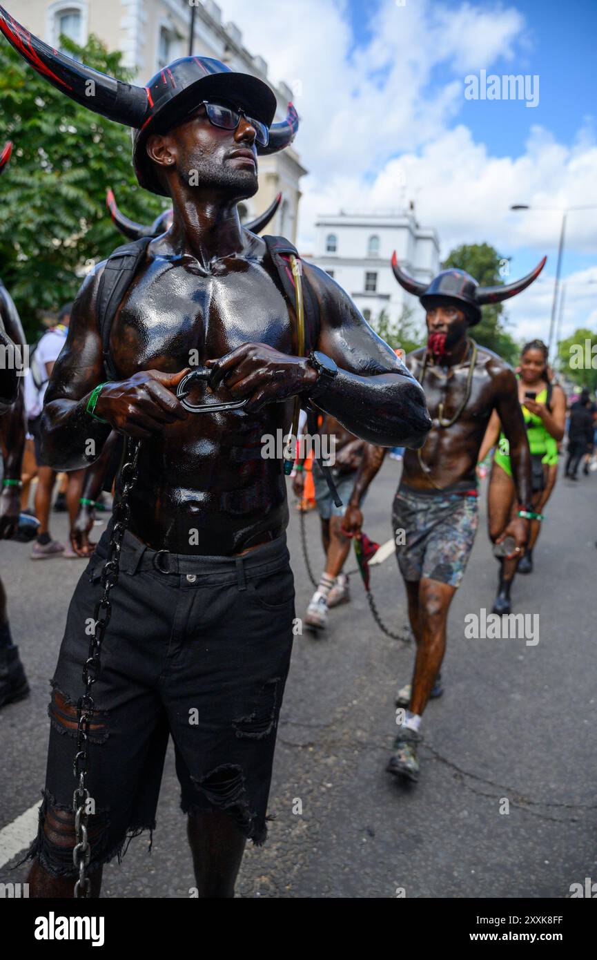 Tar men notting hill carnival hi-res stock photography and images - Alamy