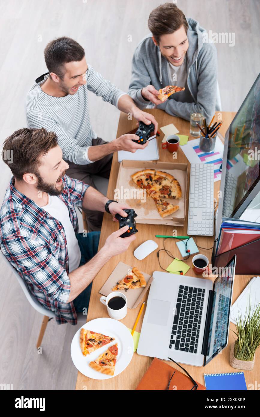 Businessman eating pizza desk hi-res stock photography and images - Alamy