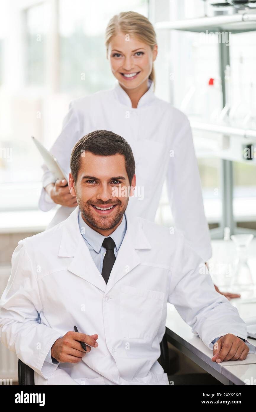 Tablet happy scientists in hi-res stock photography and images - Alamy