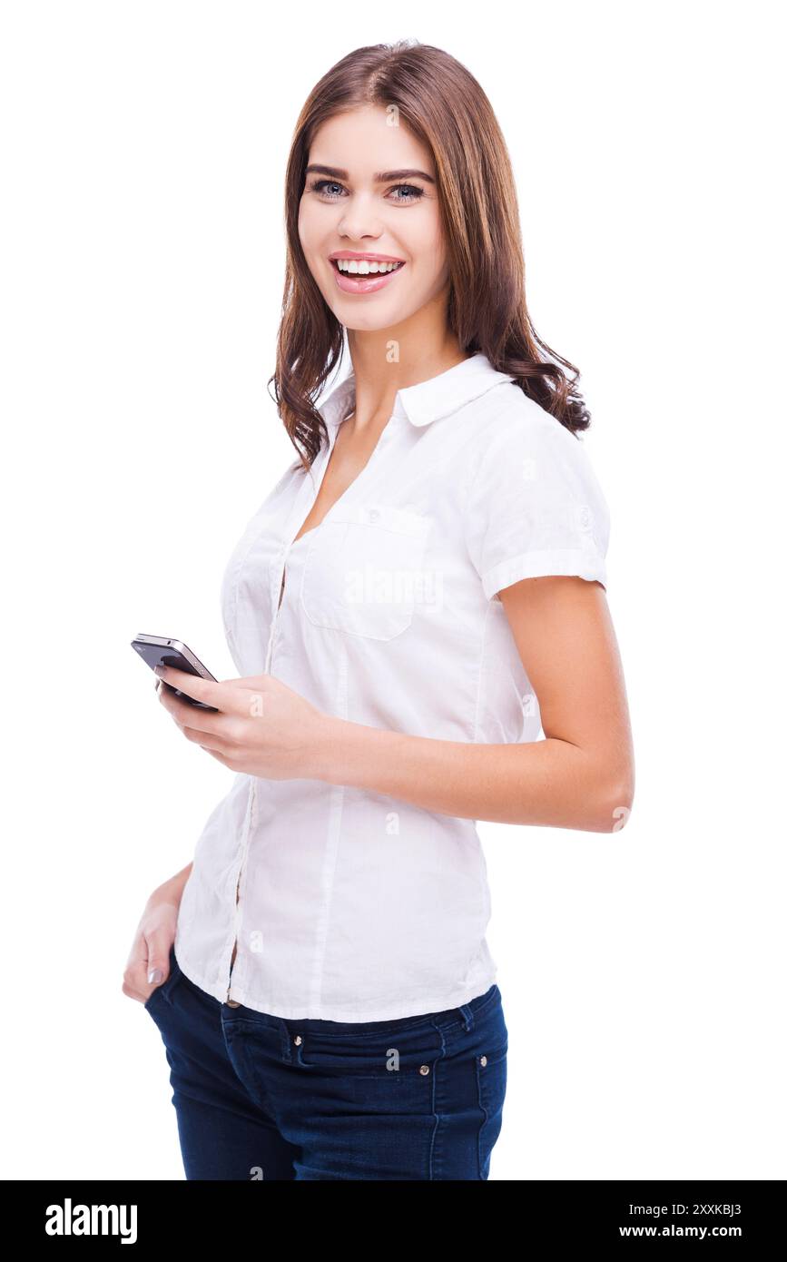 Beauty with mobile phone. Beautiful young women holding mobile phone ...