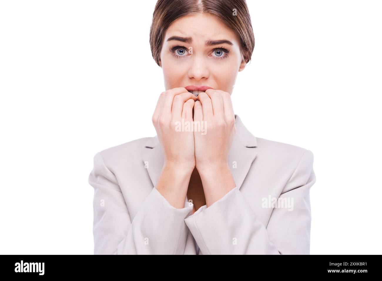 A little bit nervous about this business. Nervous young businesswoman ...