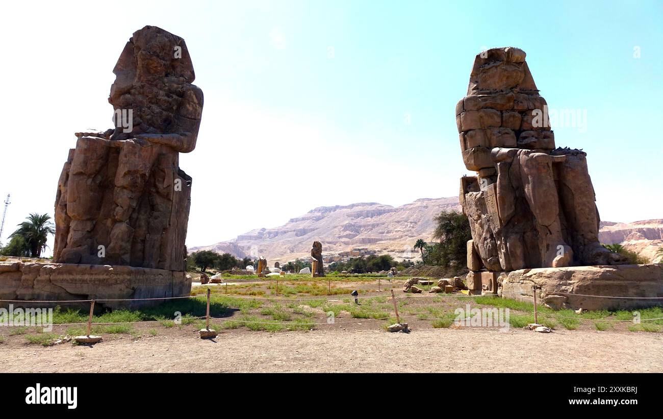The colossal statues of Memnon stand majestically in Egypt ...
