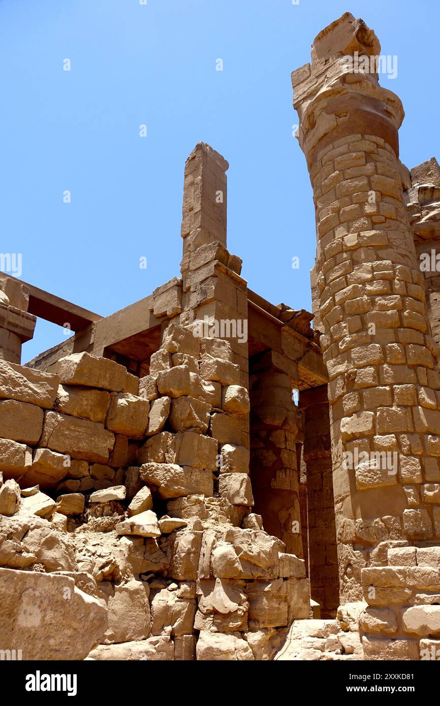 The remnants of the Karnak temple complex reveal majestic columns and ...