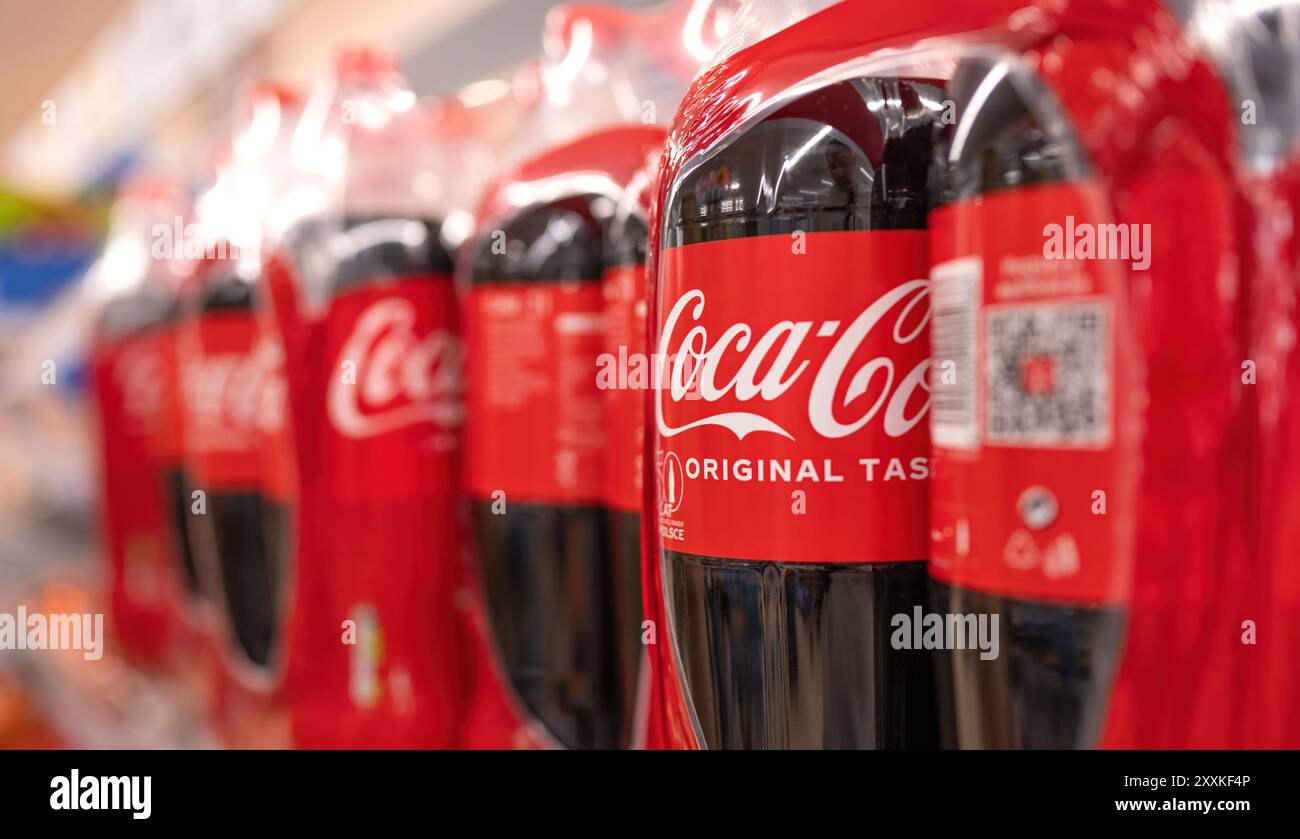 Coca Cola bottles pack in supermarket closeup. Coke fresh american ...