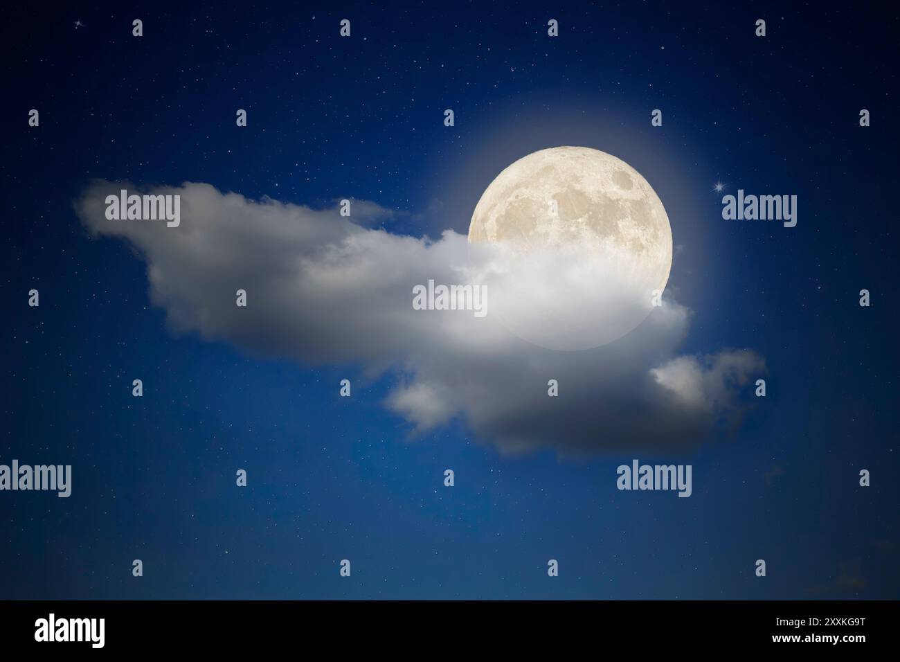 Full moon covered by a strong cloud in a starry night Stock Photo - Alamy