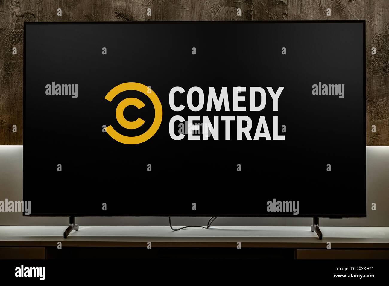 POZNAN, POL - DEC 19, 2023: Flat-screen TV set displaying logo of ...