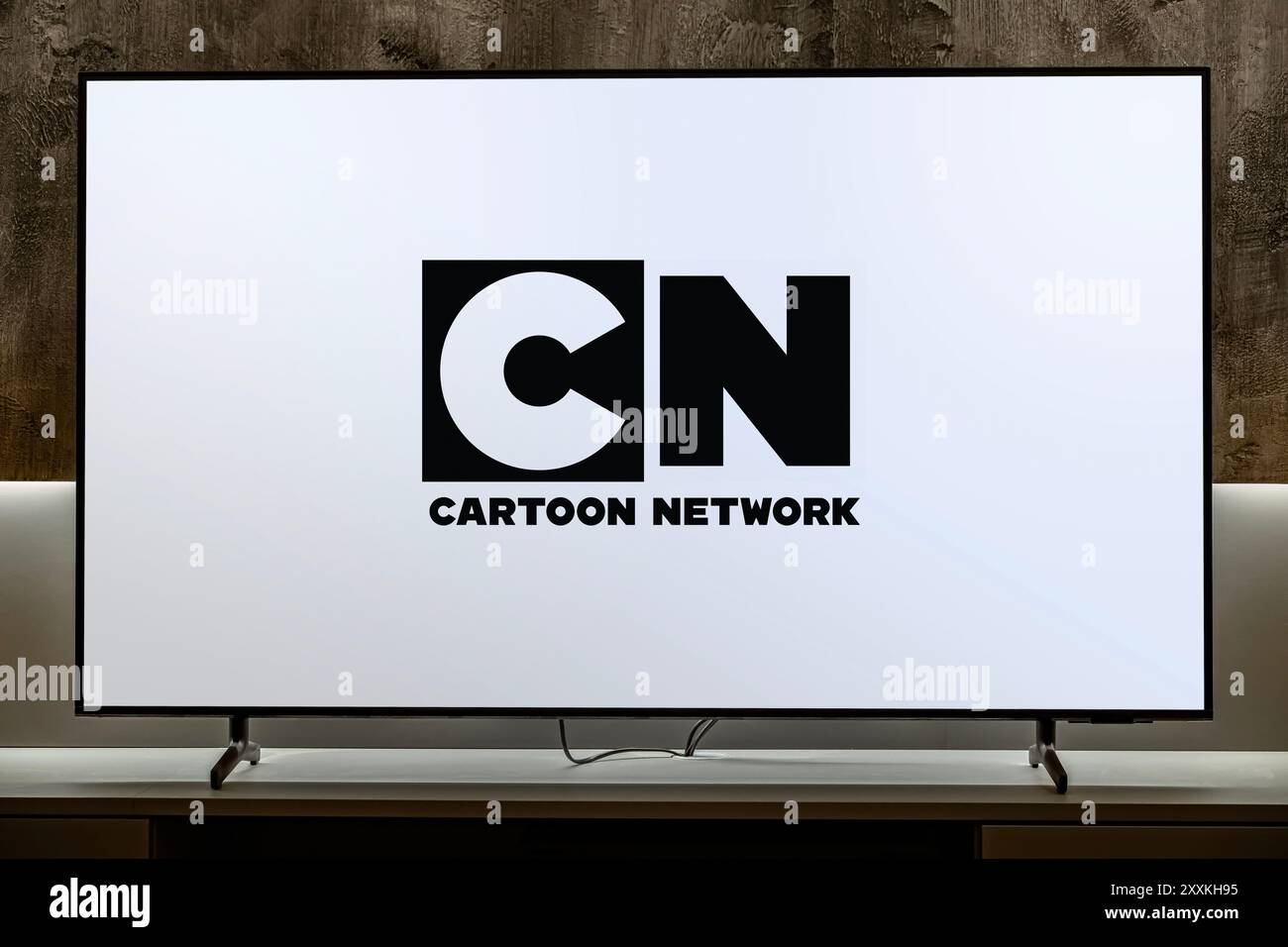 POZNAN, POL - DEC 19, 2023: Flat-screen TV set displaying logo of ...