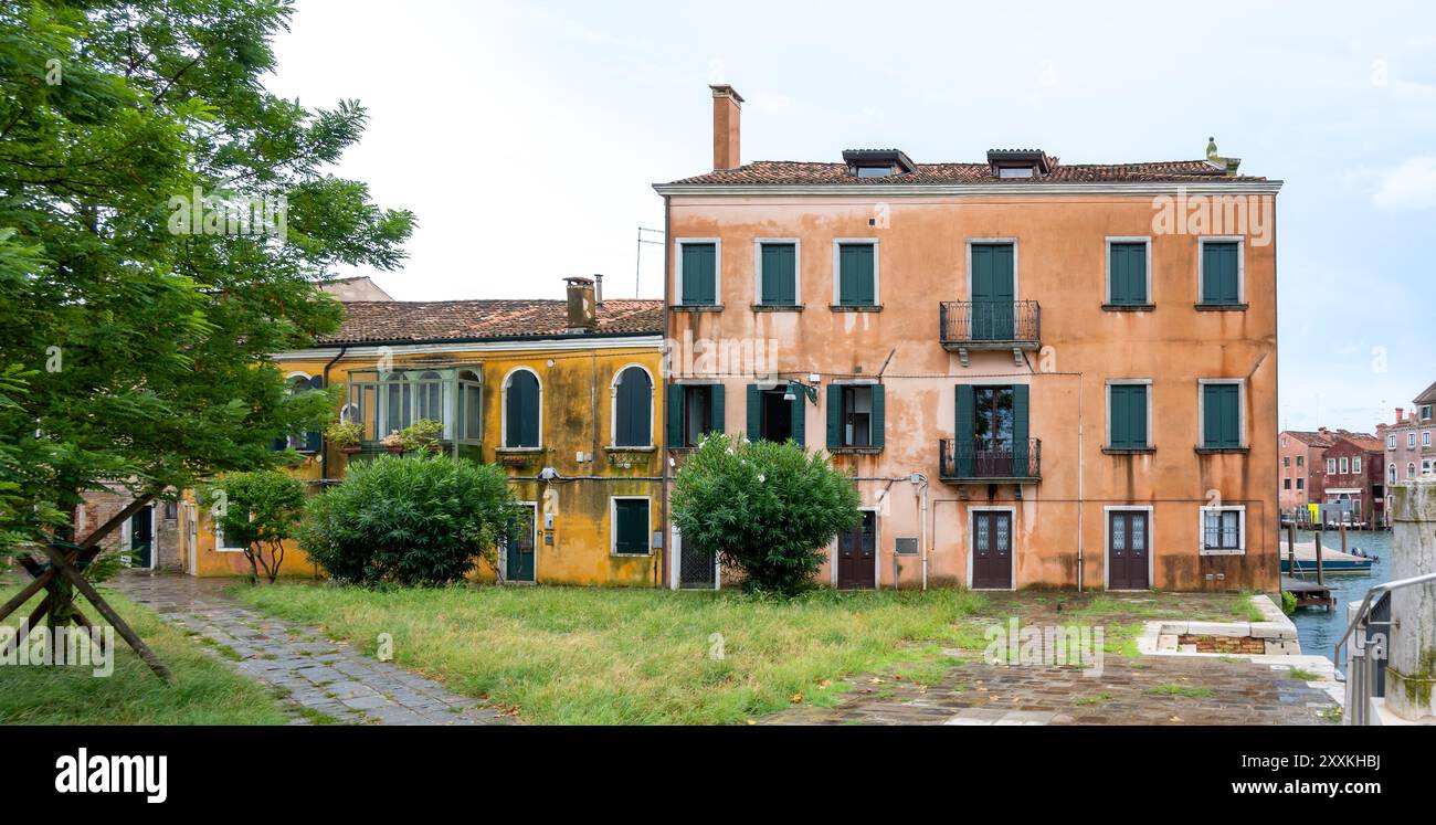 Venice, Italy, Classic orange building in the Castello quarter ...