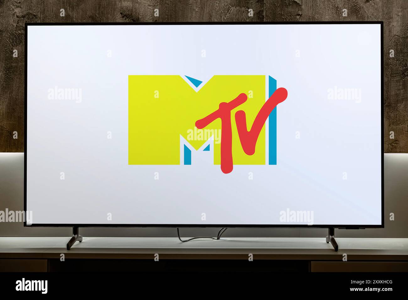 POZNAN, POL - DEC 19, 2023: Flat-screen TV set displaying logo of MTV ...