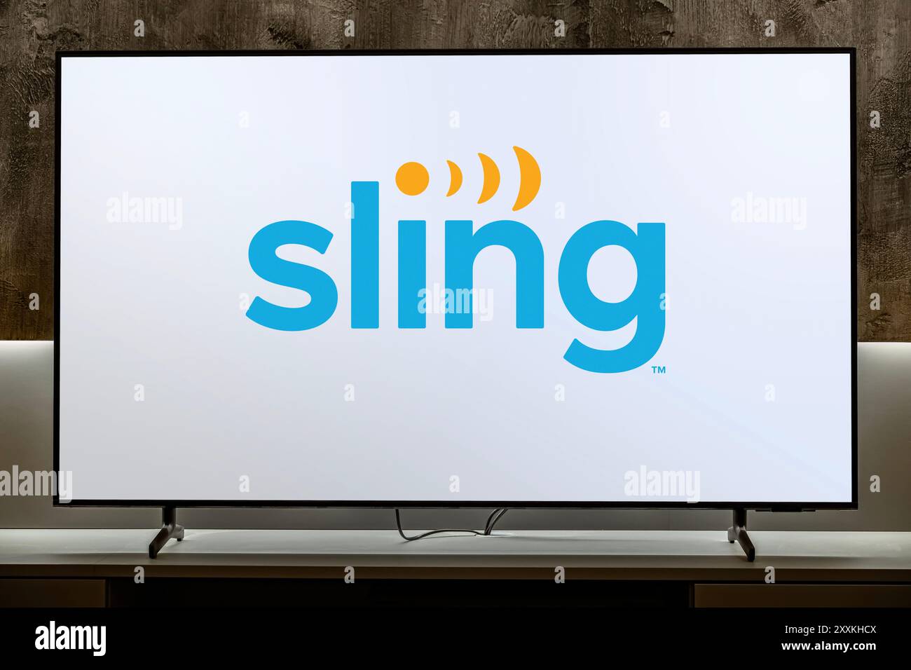 POZNAN, POL - DEC 19, 2023: Flat-screen TV set displaying logo of Sling ...