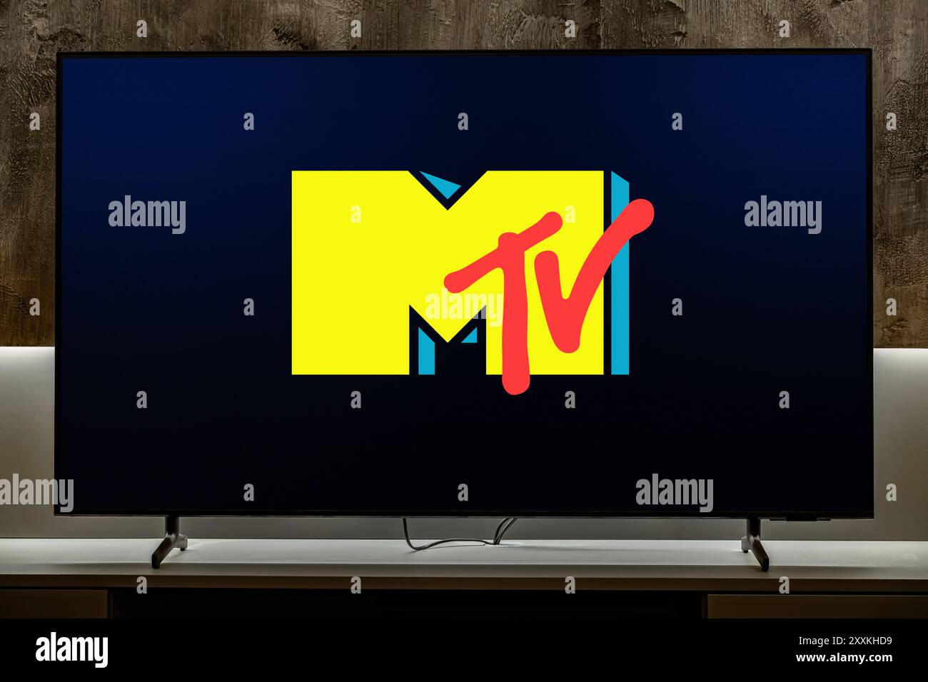 POZNAN, POL - DEC 19, 2023: Flat-screen TV set displaying logo of MTV ...