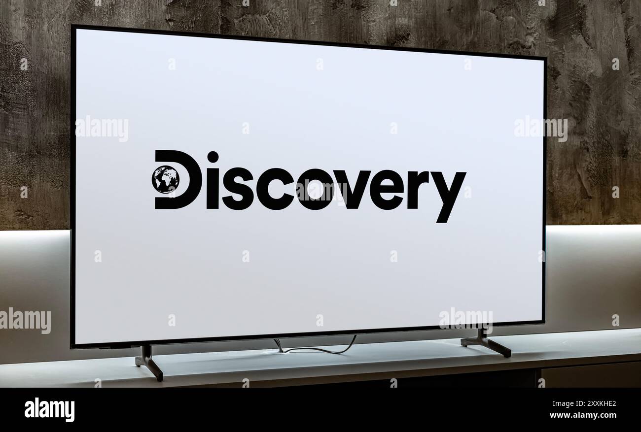 POZNAN, POL - DEC 19, 2023: Flat-screen TV set displaying logo of ...