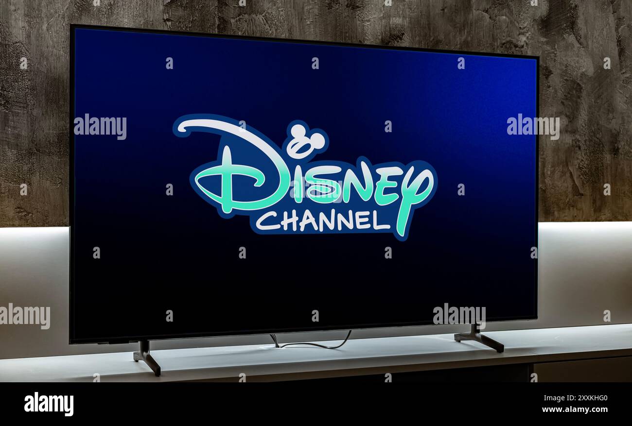 POZNAN, POL - DEC 19, 2023: Flat-screen TV set displaying logo of ...