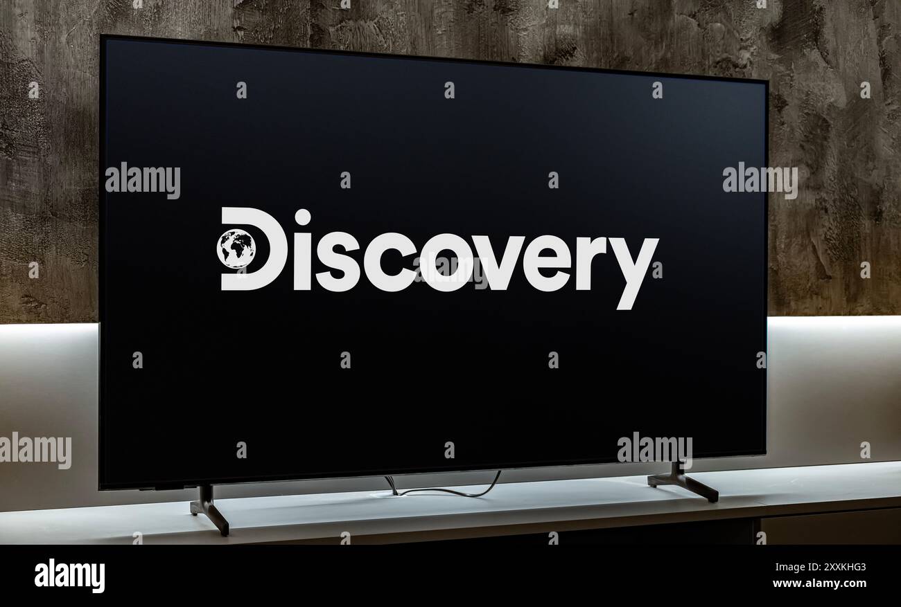 POZNAN, POL - DEC 19, 2023: Flat-screen TV set displaying logo of ...