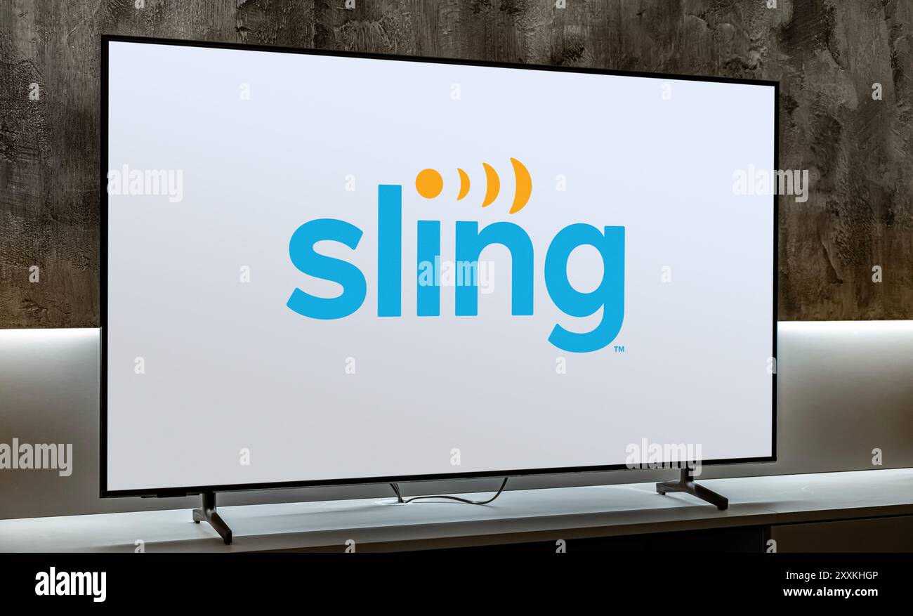 POZNAN, POL - DEC 19, 2023: Flat-screen TV set displaying logo of Sling ...