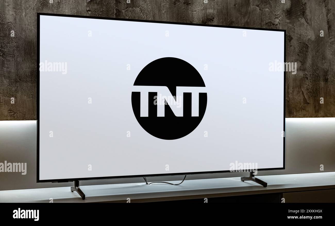 POZNAN, POL - DEC 19, 2023: Flat-screen TV set displaying logo of TNT ...