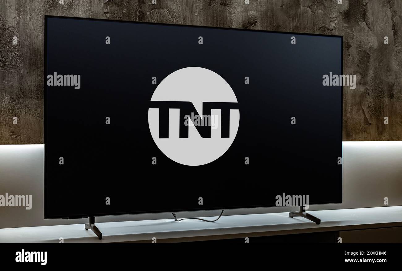 POZNAN, POL - DEC 19, 2023: Flat-screen TV set displaying logo of TNT ...